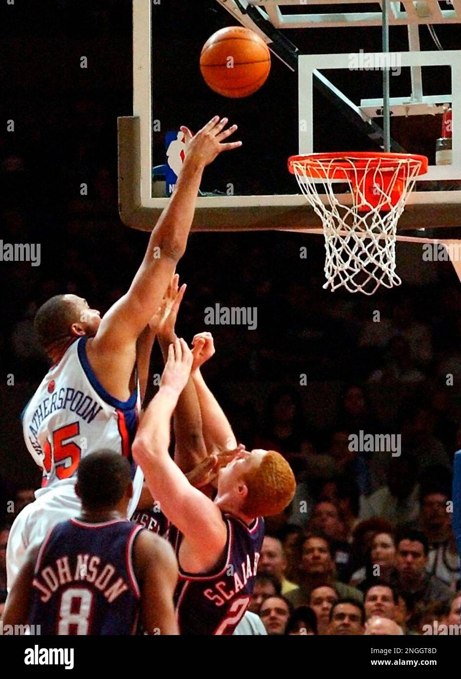 New York Knicks' Clarence Weatherspoon goes up for a shot as New Jersey ...