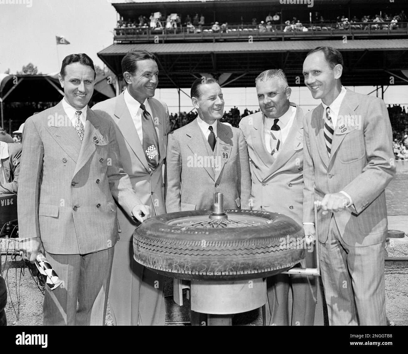 Tony Hulman, second from left, owner of the Indianapolis Speedway ...