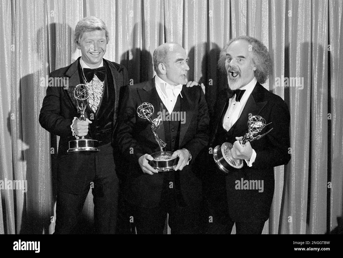 Actors William Blinn, Ed Asner, center, and David Greene pose with ...