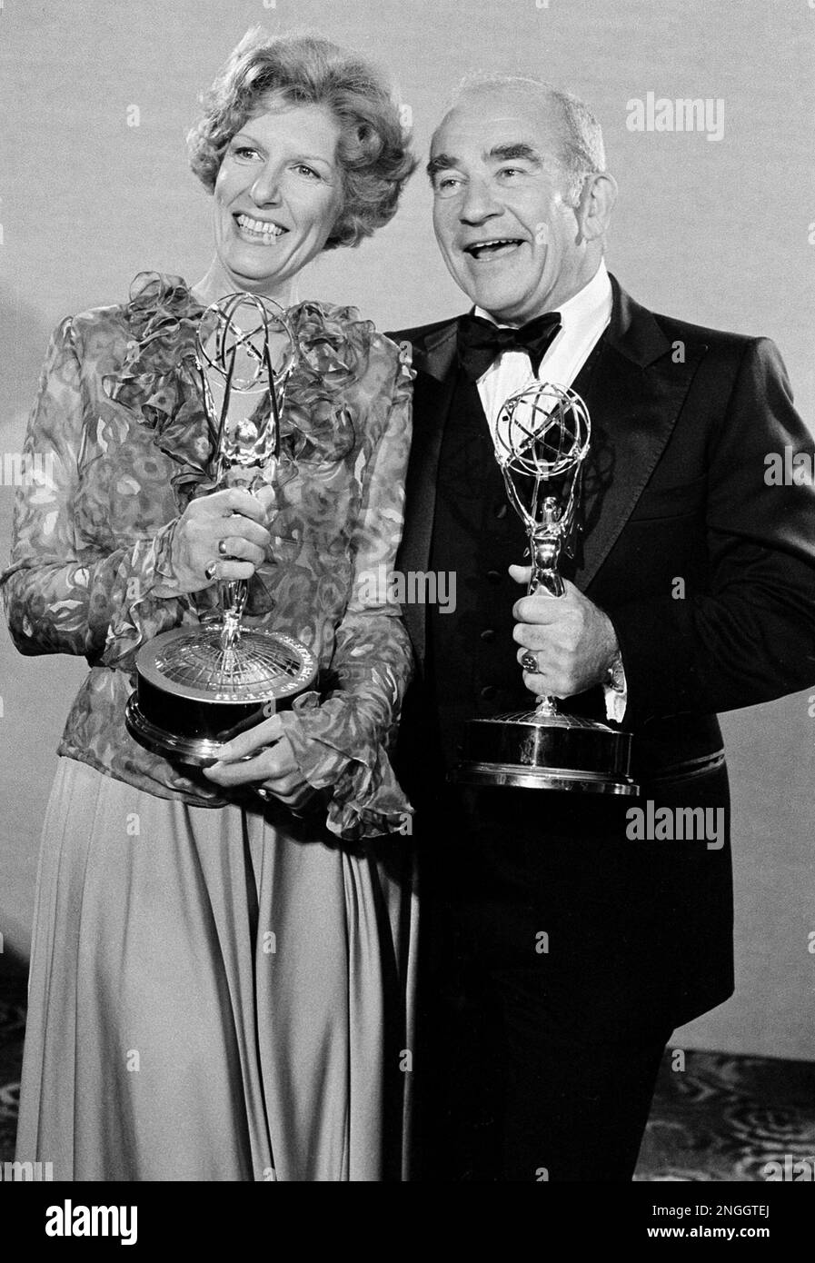 Nancy Marchand, left, and Ed Asner pose with their Emmy statuettes they ...