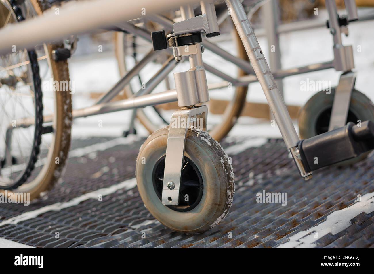 Empty wheelchair in the hospital on the ramp. Wheelchair close-up ...