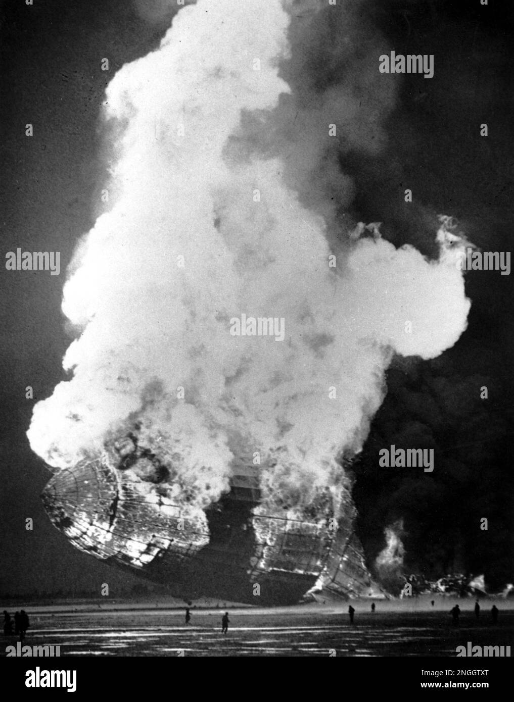 The Hindenburg zeppelin hits the ground after an explosion in mid-air ...