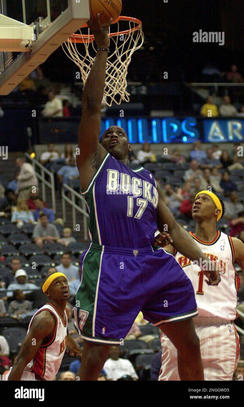 Milwaukee Bucks forward Anthony Mason makes a reverse layup as Atlanta ...
