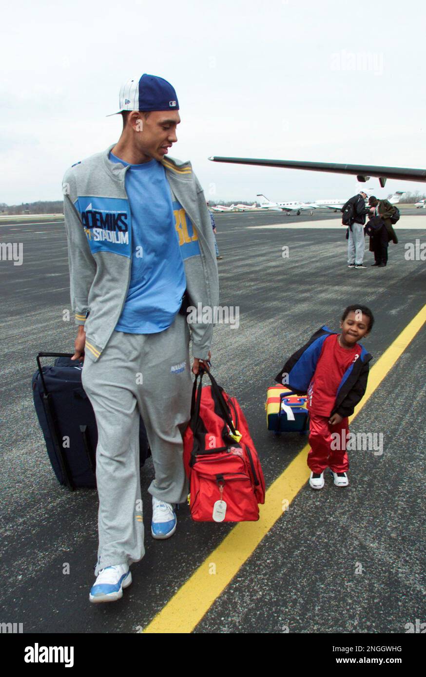 Indiana forward Jared Jeffries, left, and Antoine Davis, three-year-old ...