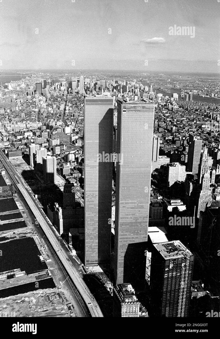 The twin towers of the World Trade Center in lower Manhattan are shown ...