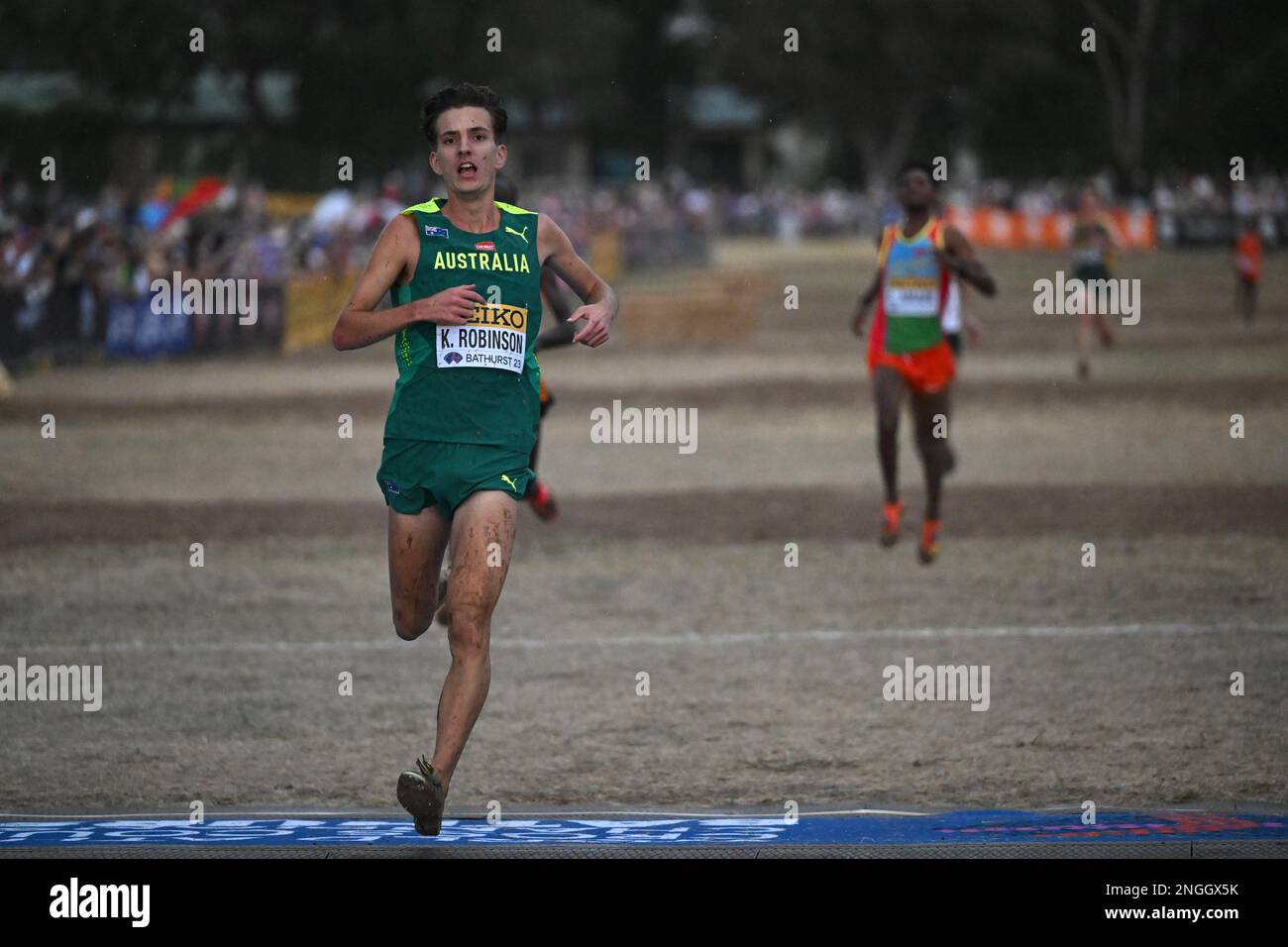 Ky Robinson of Australia crosses the finish line in 23rd place in the ...