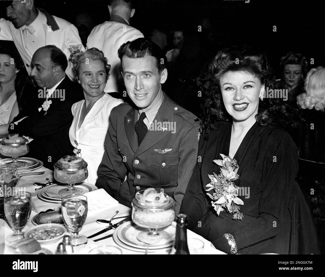 Presenters Jimmy Stewart and Ginger Rogers, right, sit together at the ...