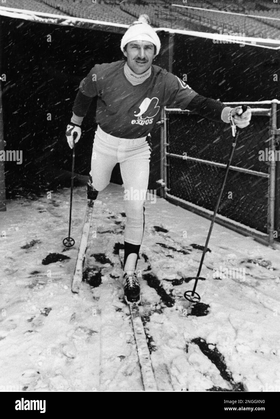 Montreal Expos shortstop Chris Speier comes prepared for the inclement ...