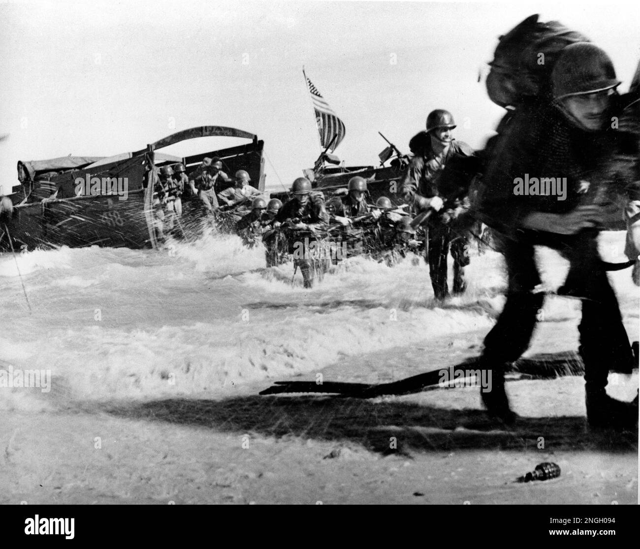 In this image provided by the U.S. Army Signal Corps, the first wave of ...