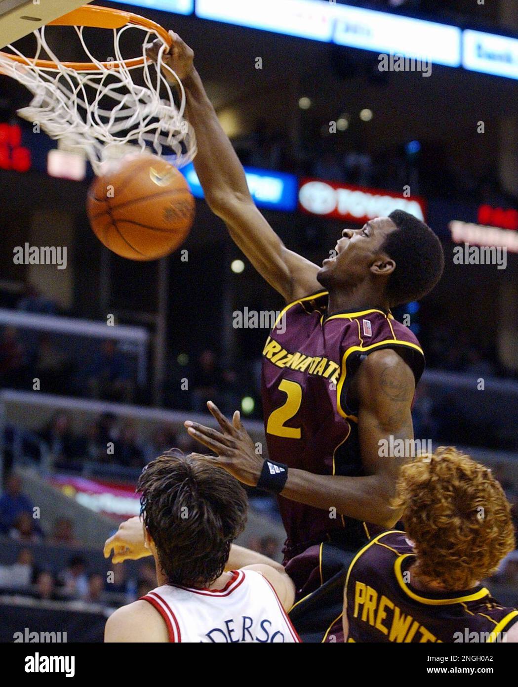 Arizona State's Donnell Knight (2) slam dunks as teammate Chad Prewitt ...