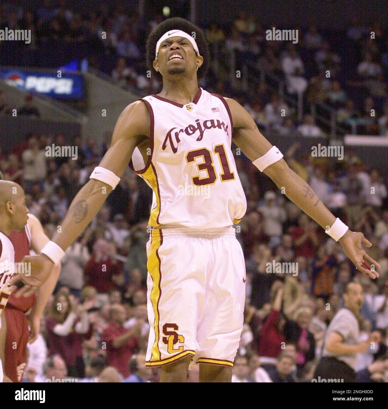 Southern Cals' Jerry Dupree (31) encourages the crowd to turn up the ...