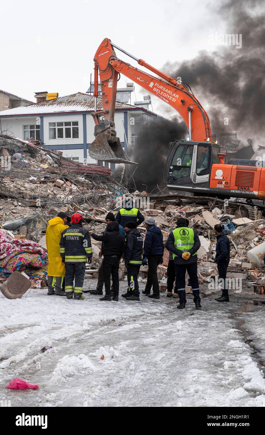 Personnel and construction equipment participating in the rescue works ...