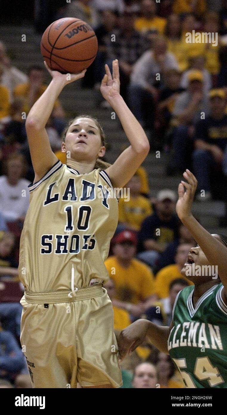 Teutopolis' Alicia Ordner shoots over Rock Island Alleman's Candice ...