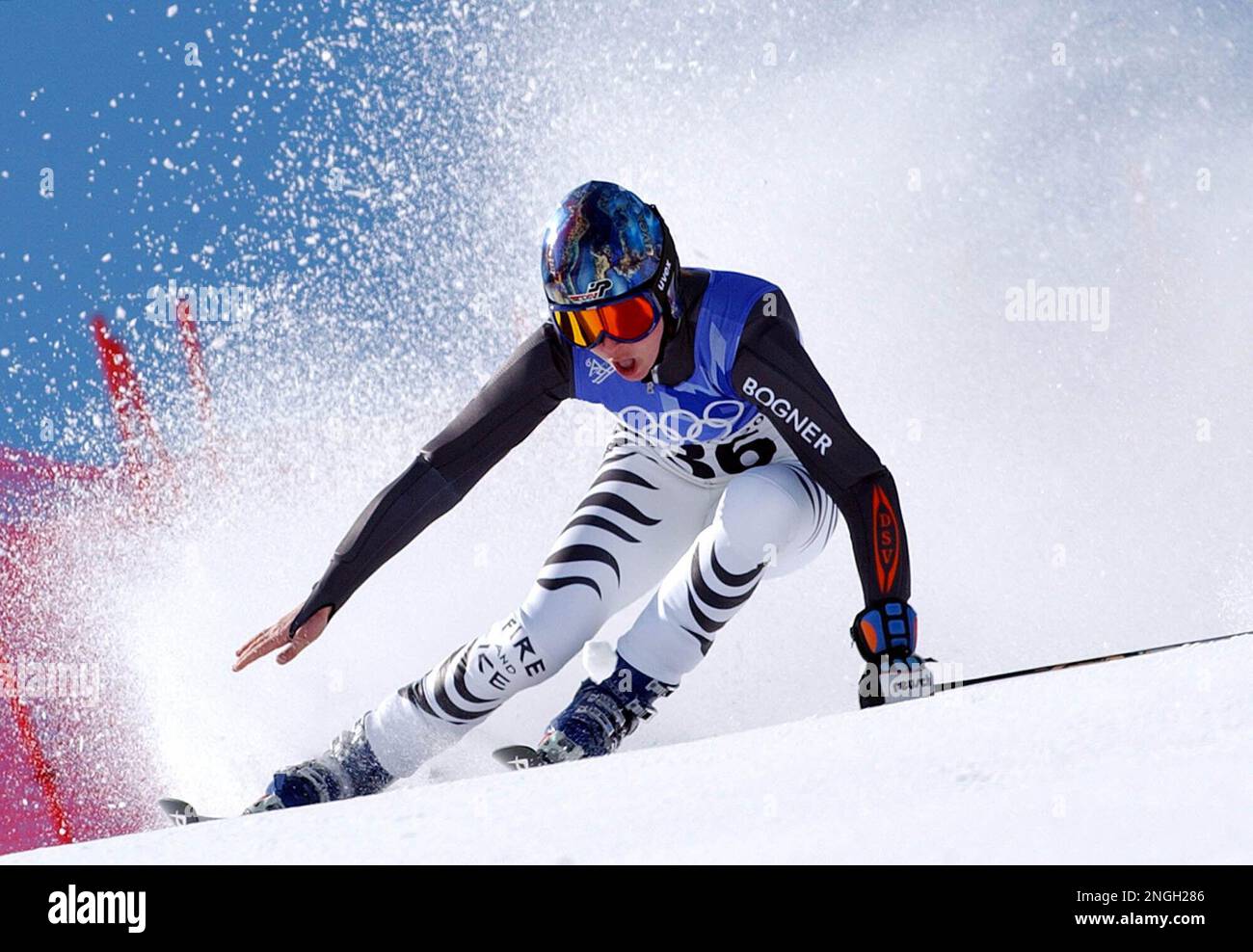 Germany's Annemarie Gerg skis around a bend after losing one of her ski ...