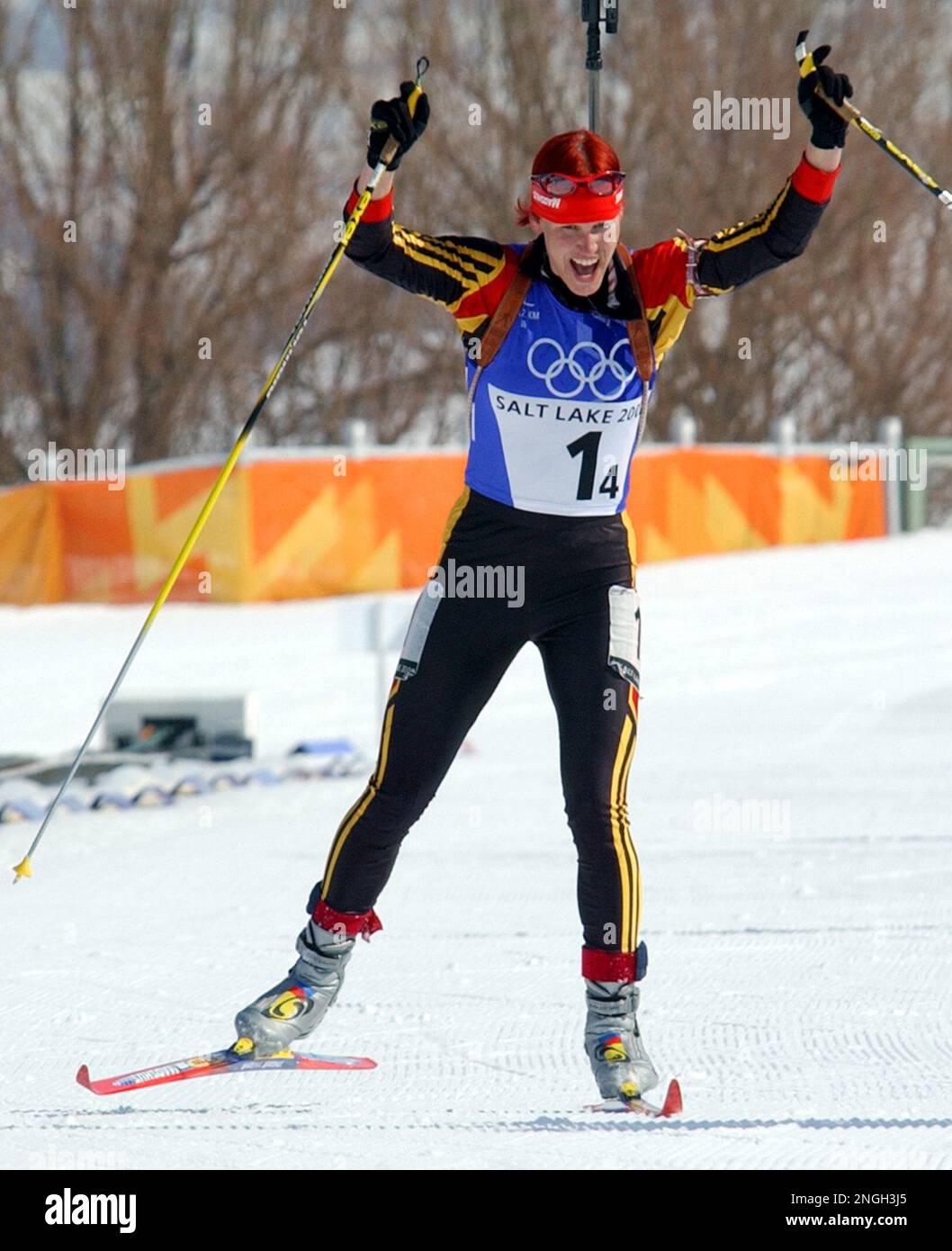 Kati Wilhem celebrates as she crosses the finish line in the women's ...