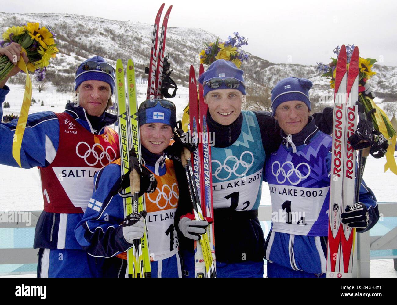 From left, Finland's team gold medalists Jari Mantila, Jaakko Tallus ...