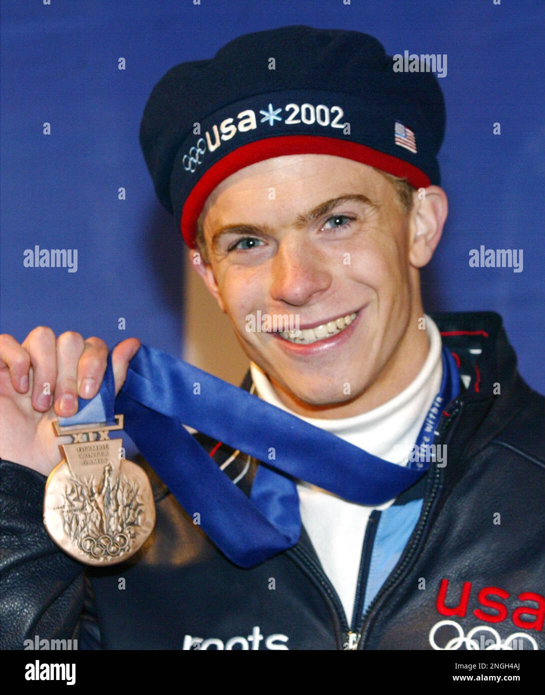 Olympic bronze medalist Timothy Goebel of the United States shows off ...
