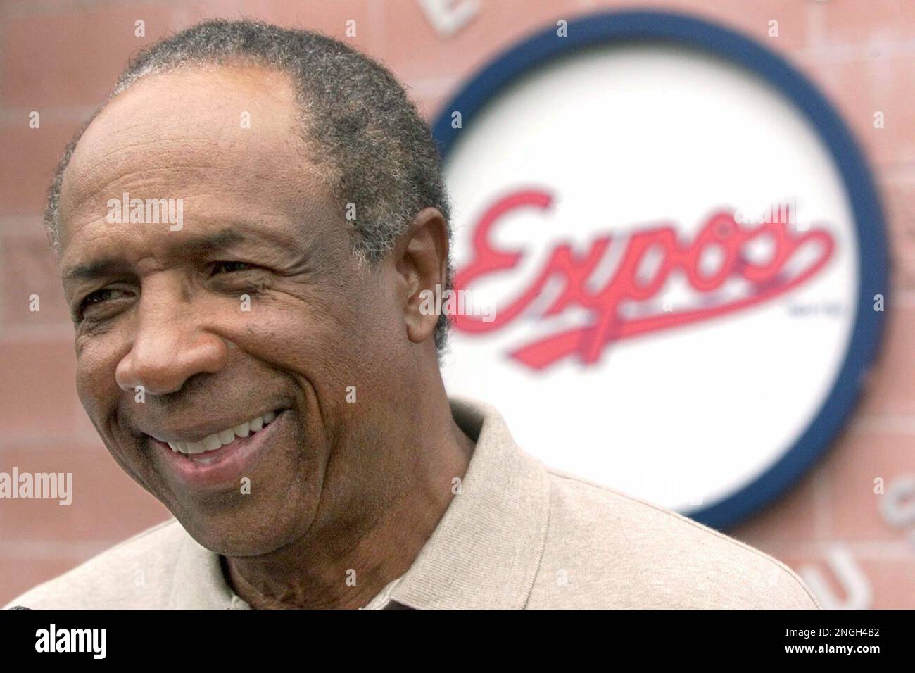 Montreal Expos manager Frank Robinson smiles as he answers questions ...
