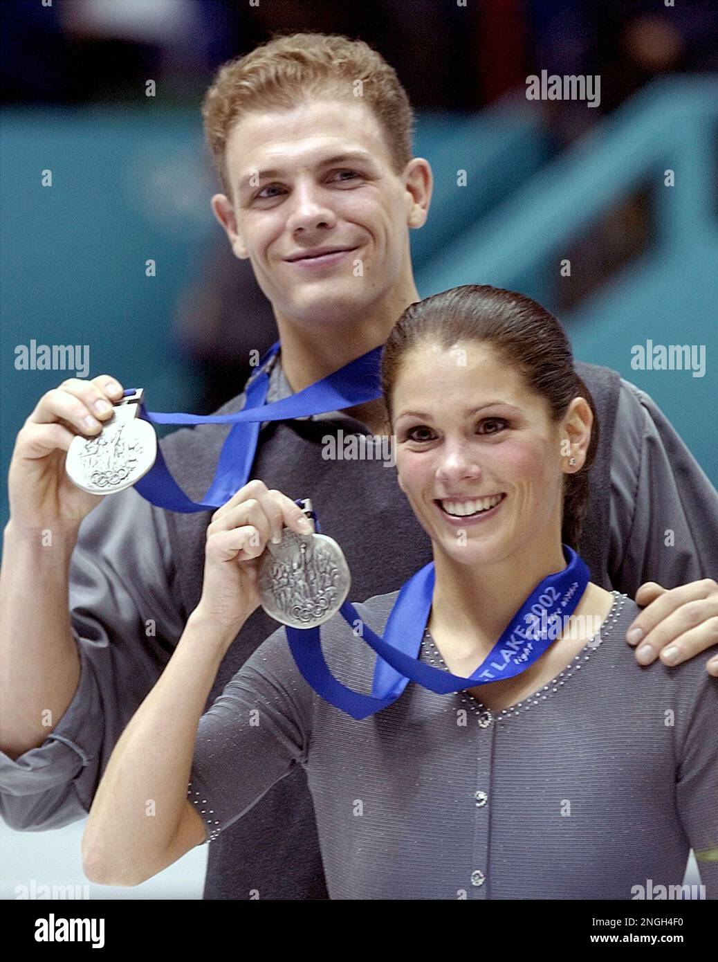 Silver medalists Jame Sale and David Pelletier of Canada pose with ...