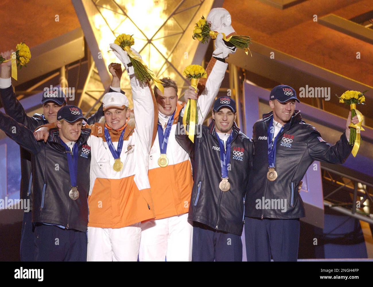 The Olympic medalists in the men's double luge acknowlegde the crowd ...