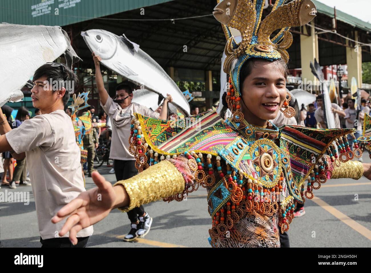 Manila, Philippines. 18th Feb, 2023. Performers dance on the street during the 2023 Sikhayan ...