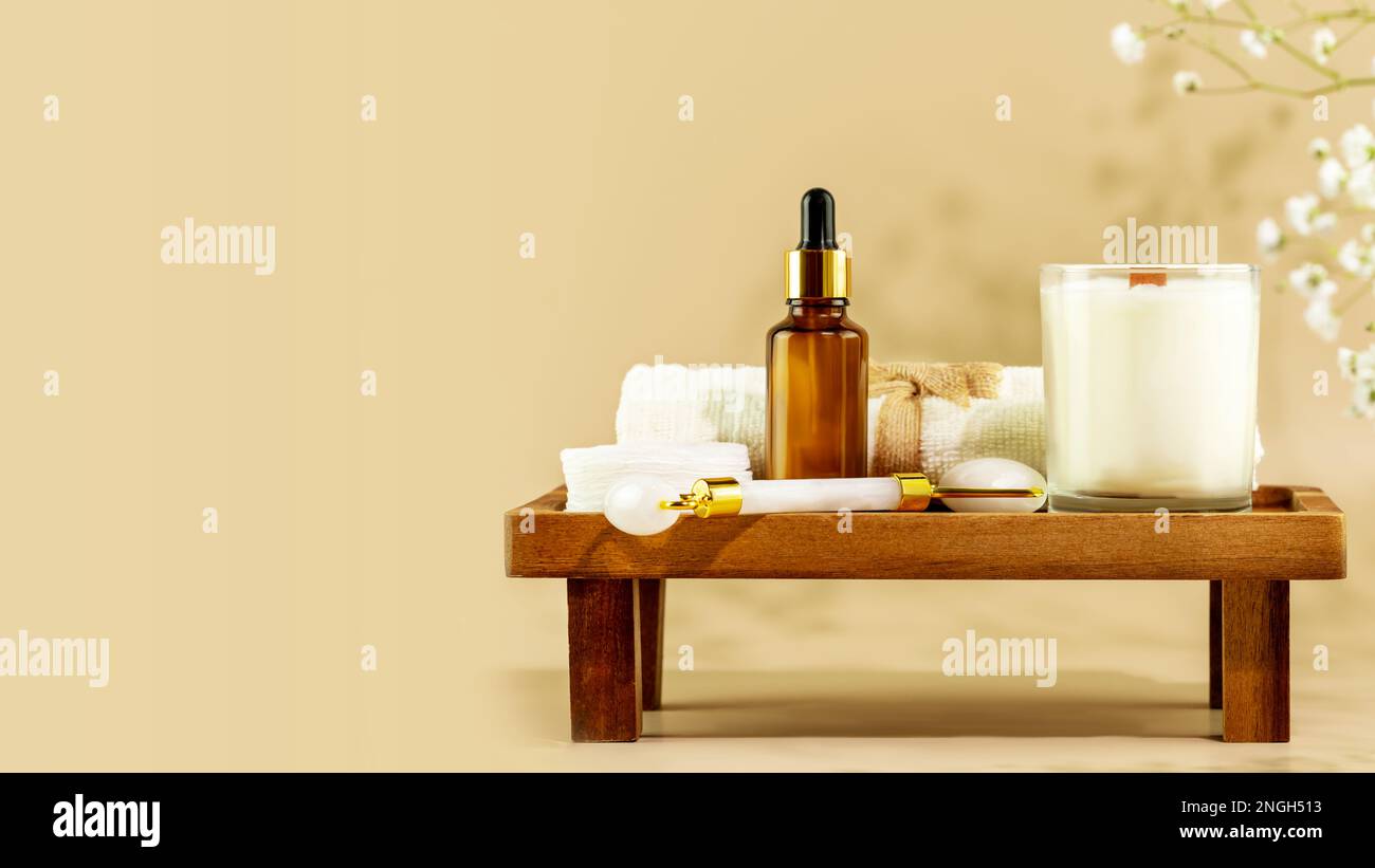 Eco friendly spa relax composition with serum, face roller, towel and ...