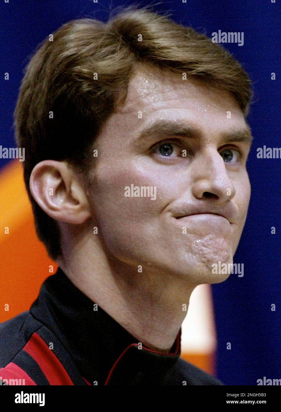 US figure skater Todd Eldredge reacts to his score after competing in the men's short program in ...