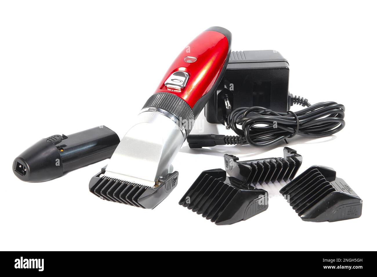 Hair clipper, attachments of different sizes, extra battery, charger in ...
