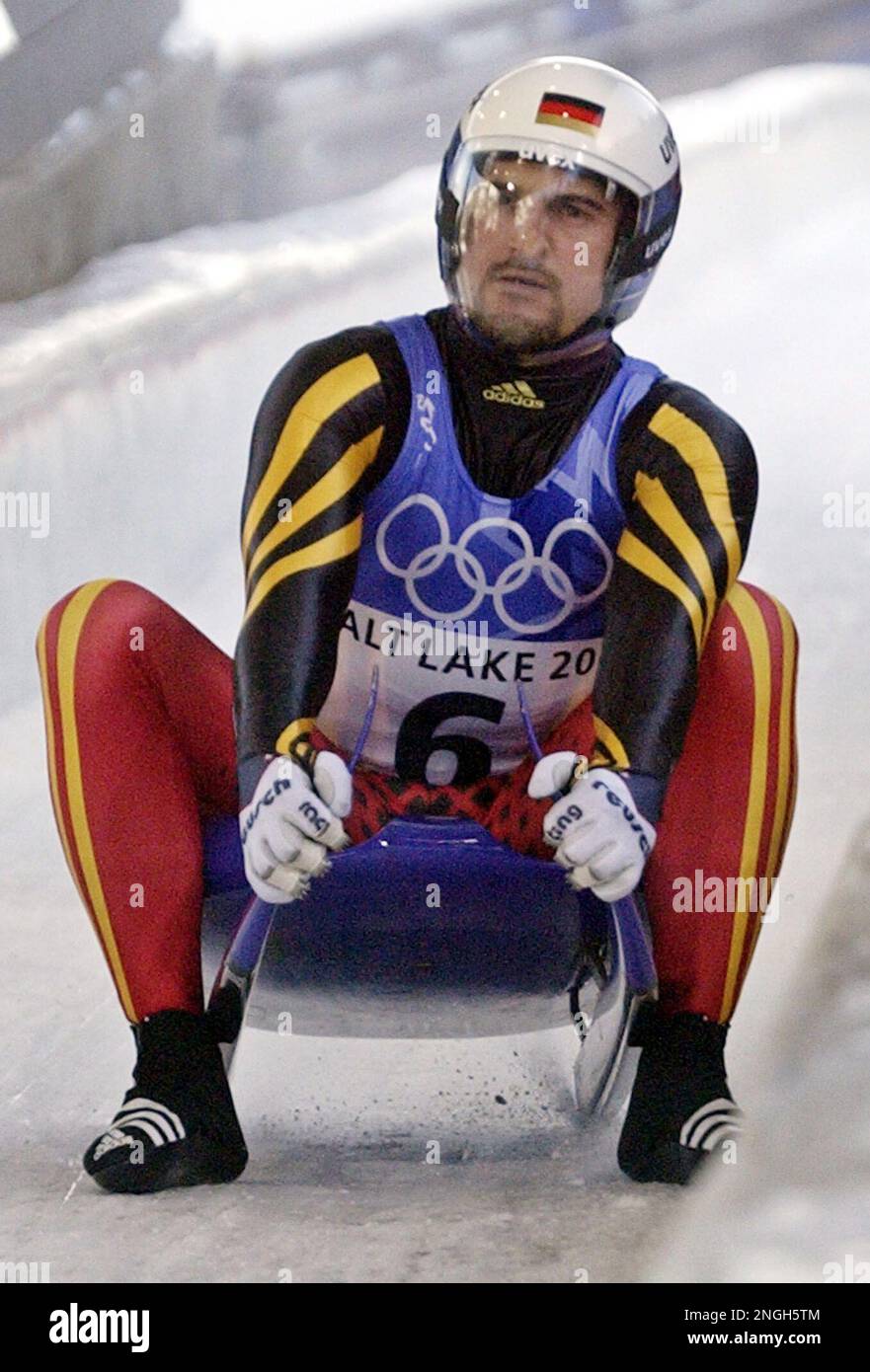 Georg Hackl of Germany brakes in the finish area after run 3 during the ...