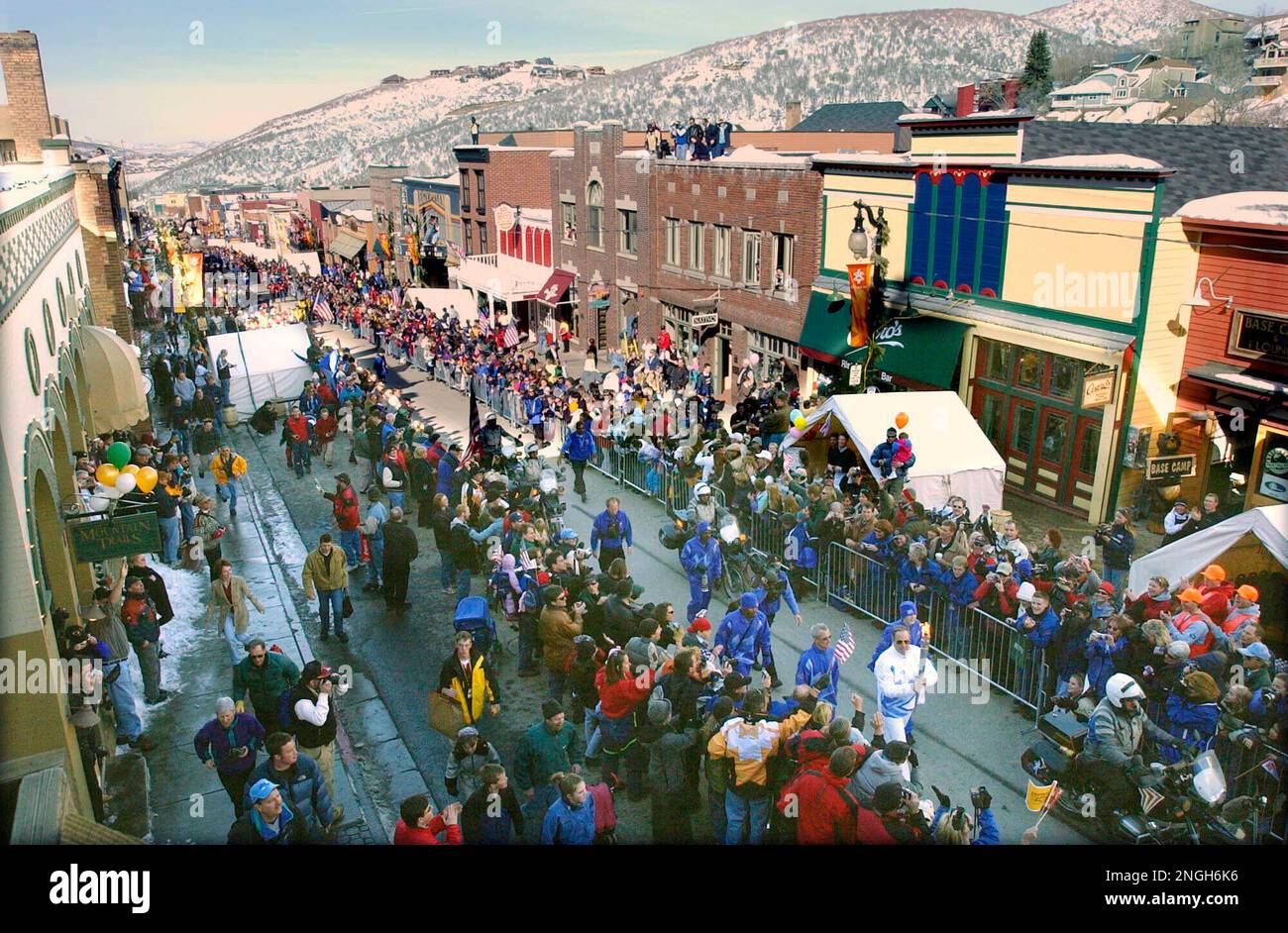 Brad Olch, the former mayor of Park City, Utah carries the Olympic ...