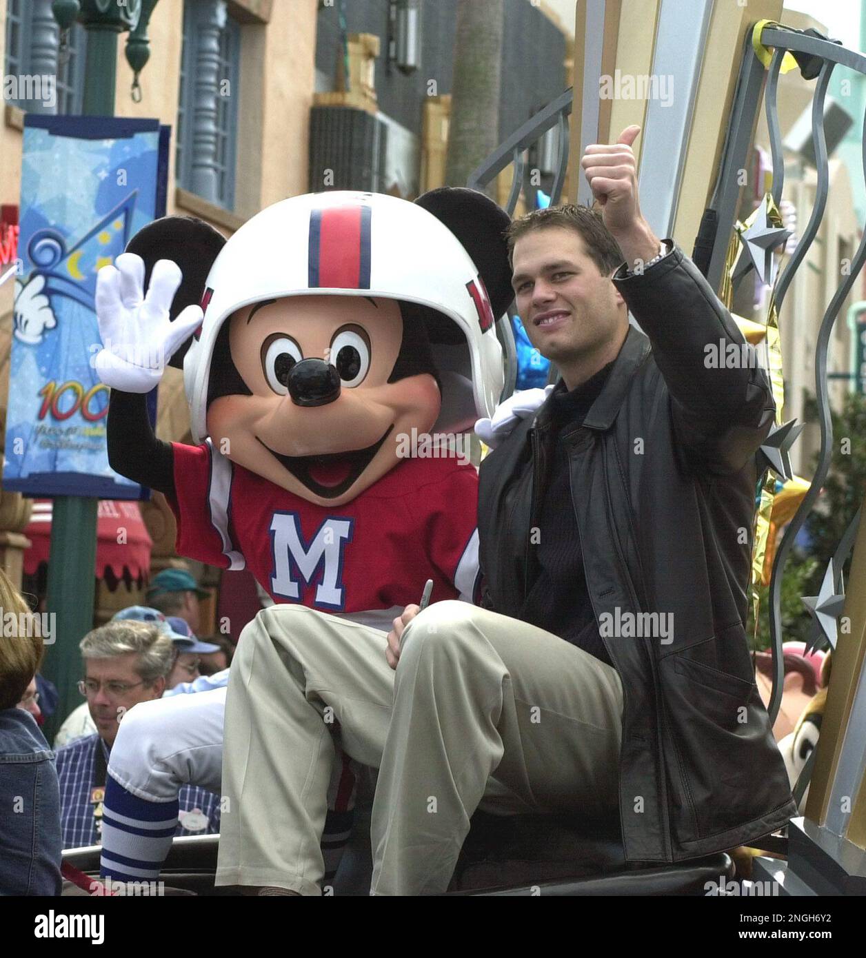 Super Bowl XXXVI most valuable player Tom Brady rides with Mickey Mouse ...