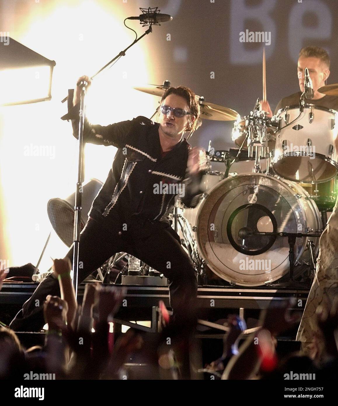 Bono, lead singer of the band U2, performs during halftime of Super ...