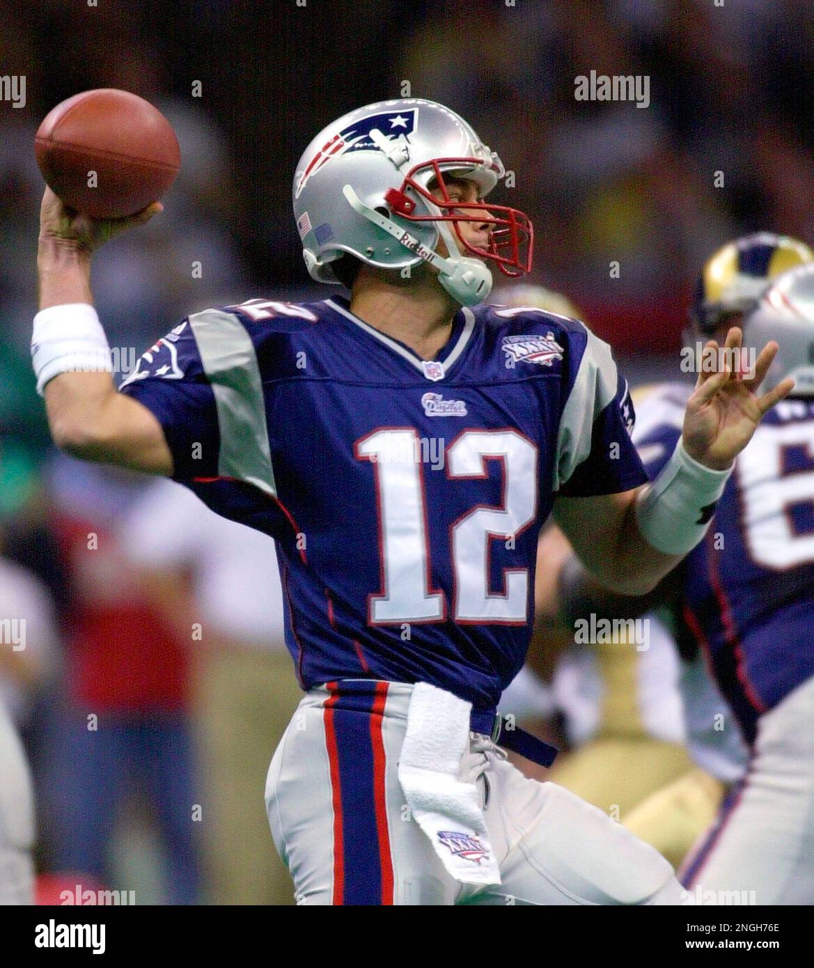 New England Patriots quarterback Tom Brady passes in the first quarter ...