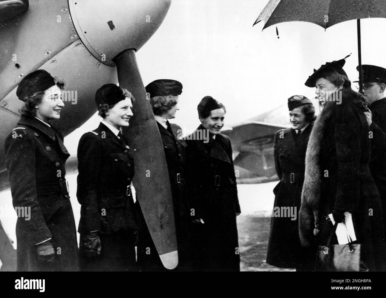 U.S. First Lady Eleanor Roosevelt, right, talks with American women ...