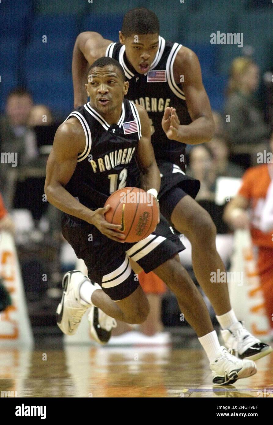 Providence's John Linehan (12) takes control of the ball as teammate ...