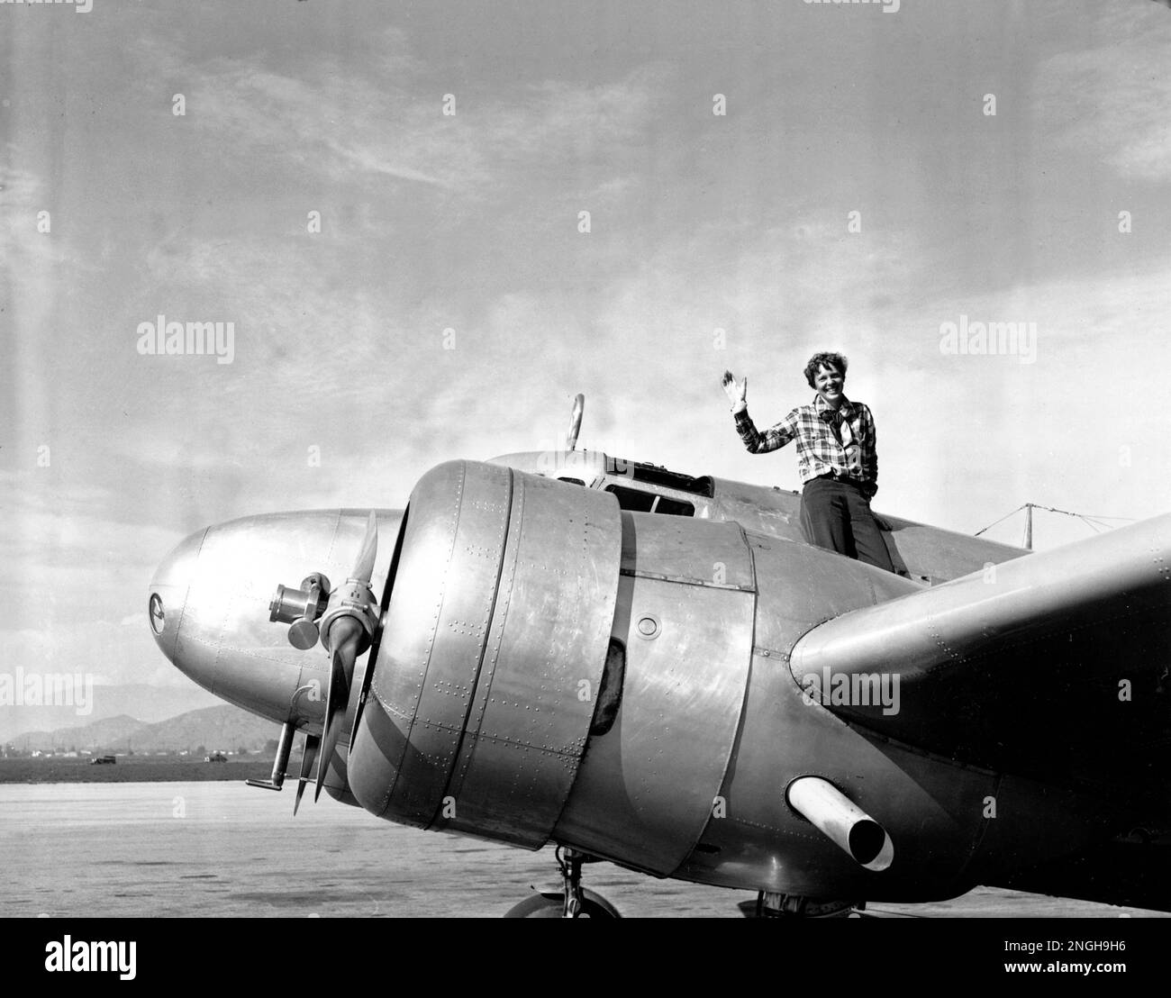 American aviatrix Amelia Earhart waves from the Electra before taking ...