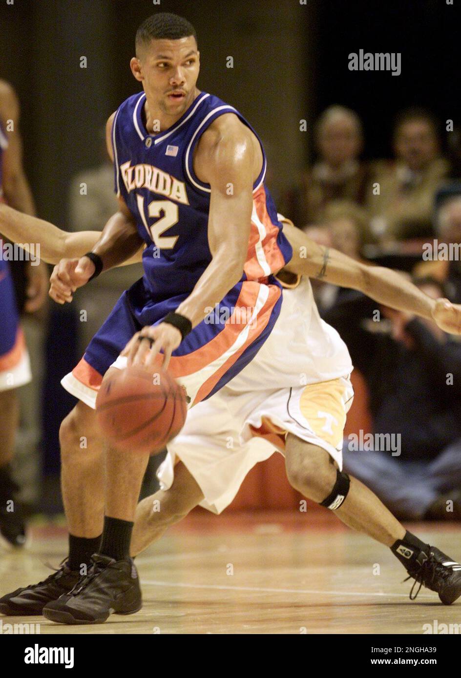 Florida's Justin Hamilton works the ball against Tennessee Thaydeus ...