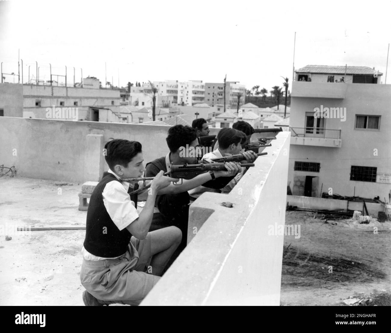 Members of the National Military Organization Irgun Zvai Leumi are ...