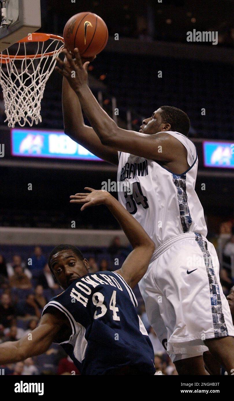 Georgetown's Mike Sweetney, right, goes to the basket against Howard's ...