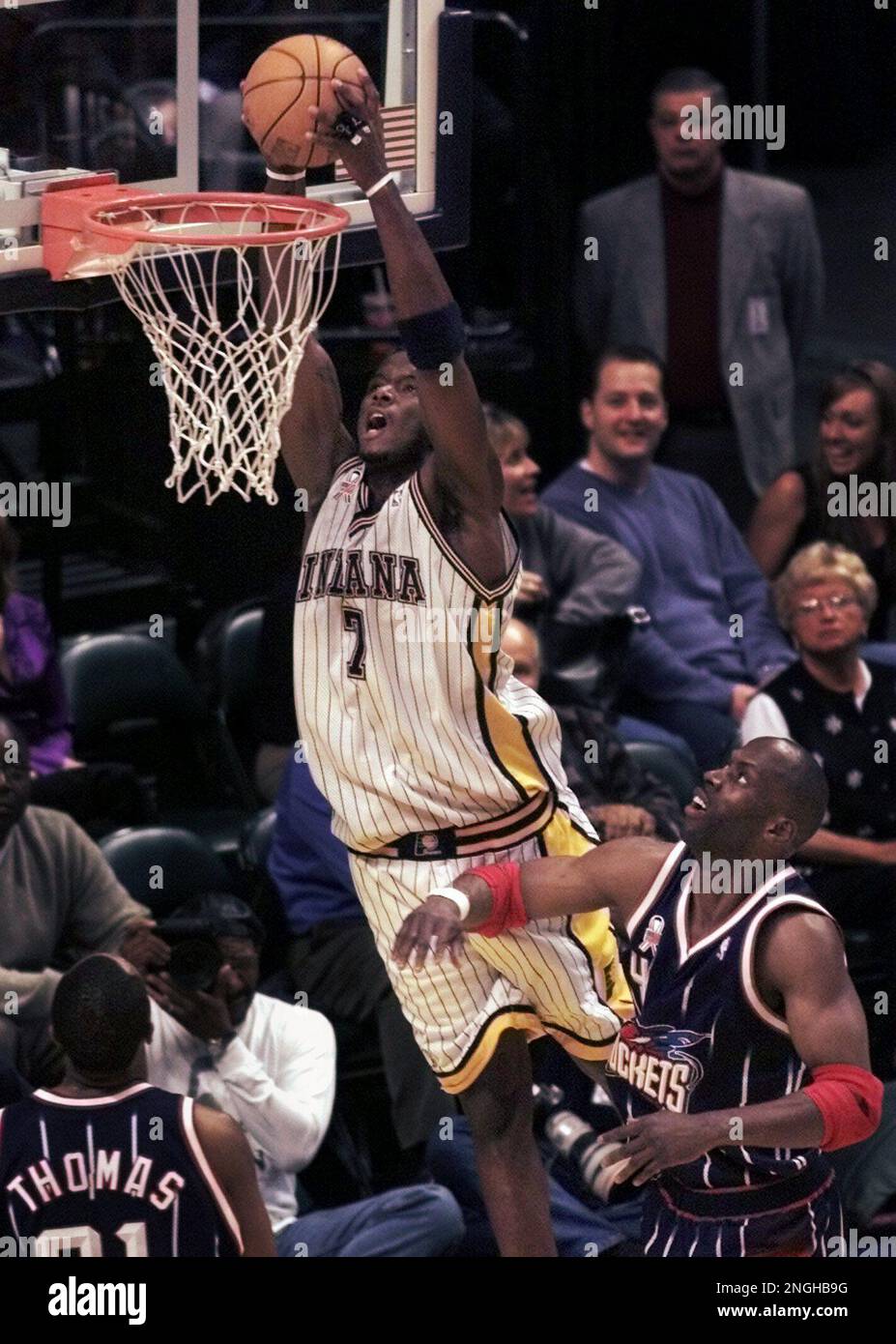 Indiana Pacers forward Jermaine O'Neal, center, gets the bucket on a ...