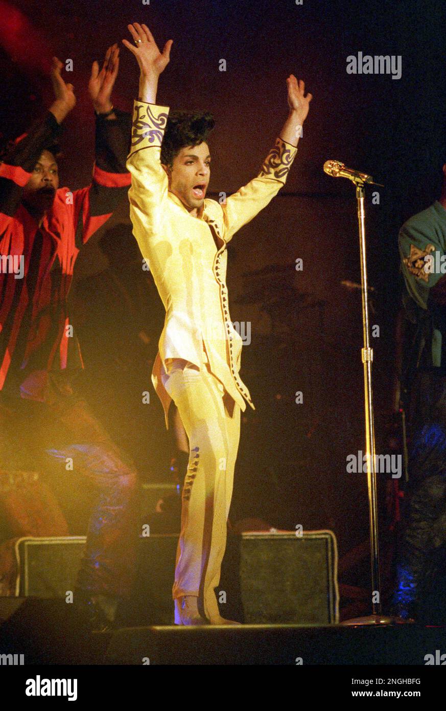 Prince sings "Thunder" with his band the New Power Generation as they ...