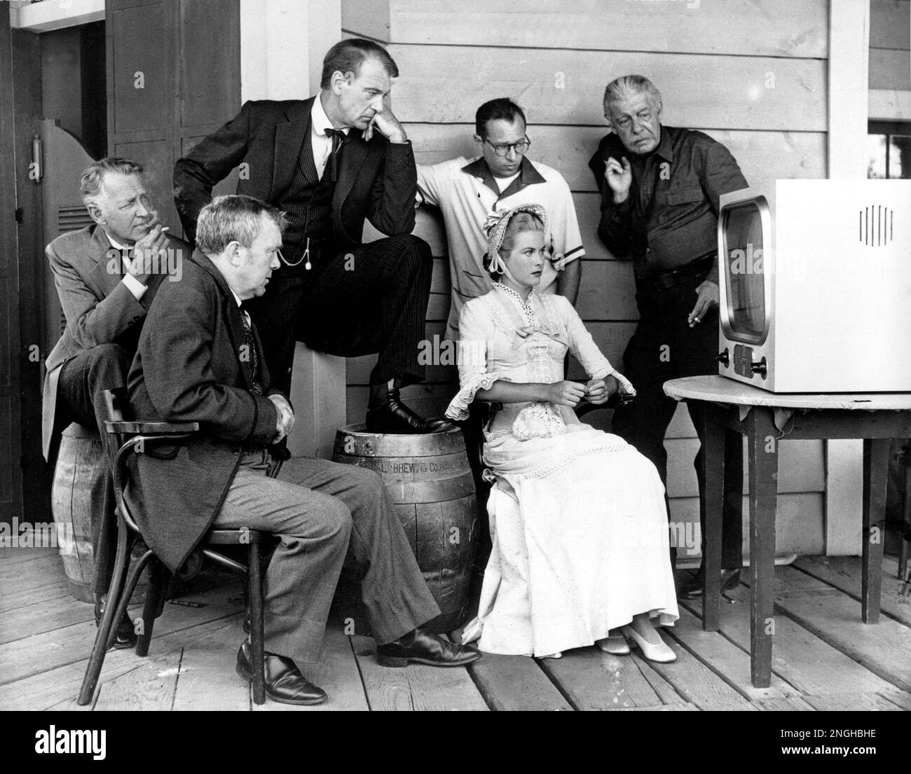 Cast members of "High Noon" watch the World Series opener between the ...