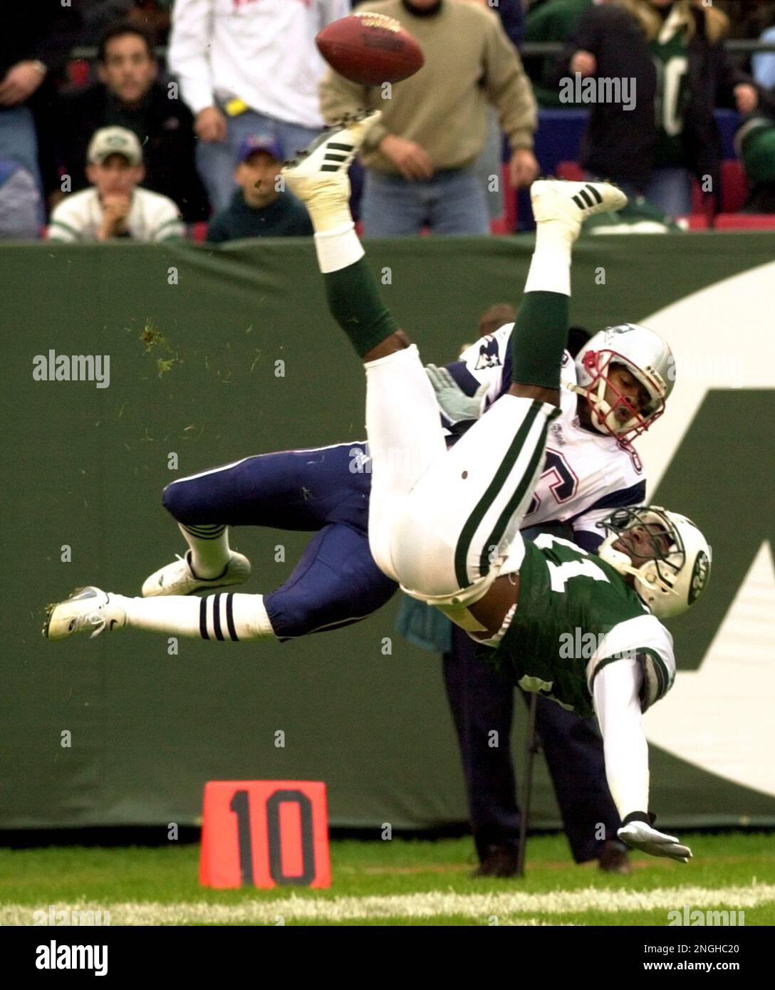 New York Jets cornerback Aaron Glenn breaks up a pass intended for New ...