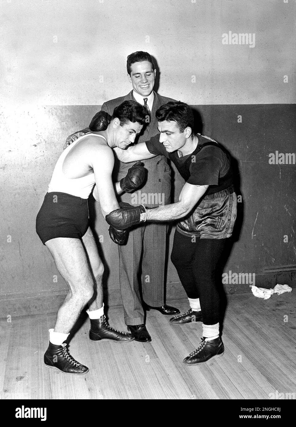 Anton Christofaridas, right, light heavyweight champ of Greece gets a ...