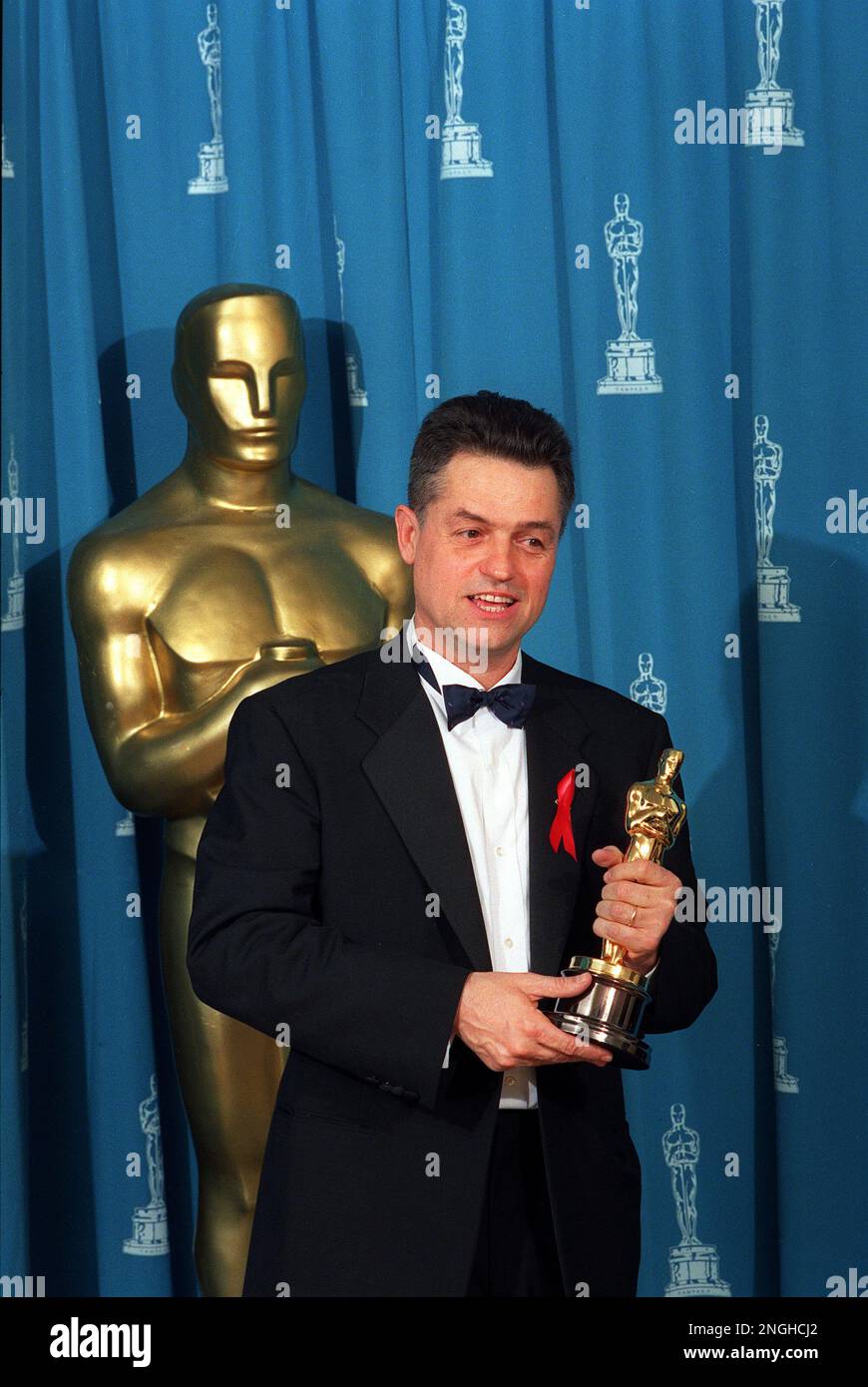 Jonathan Demme poses with his Oscar statuette backstage at the 64th ...