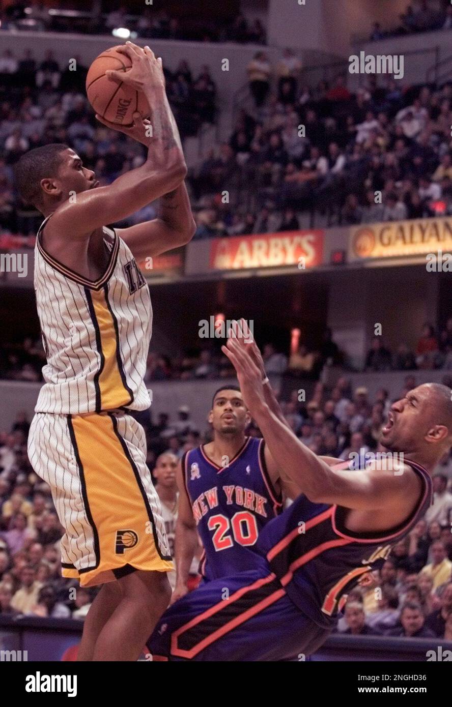 New York Knicks guard Mark Jackson, right, draws the charge from ...