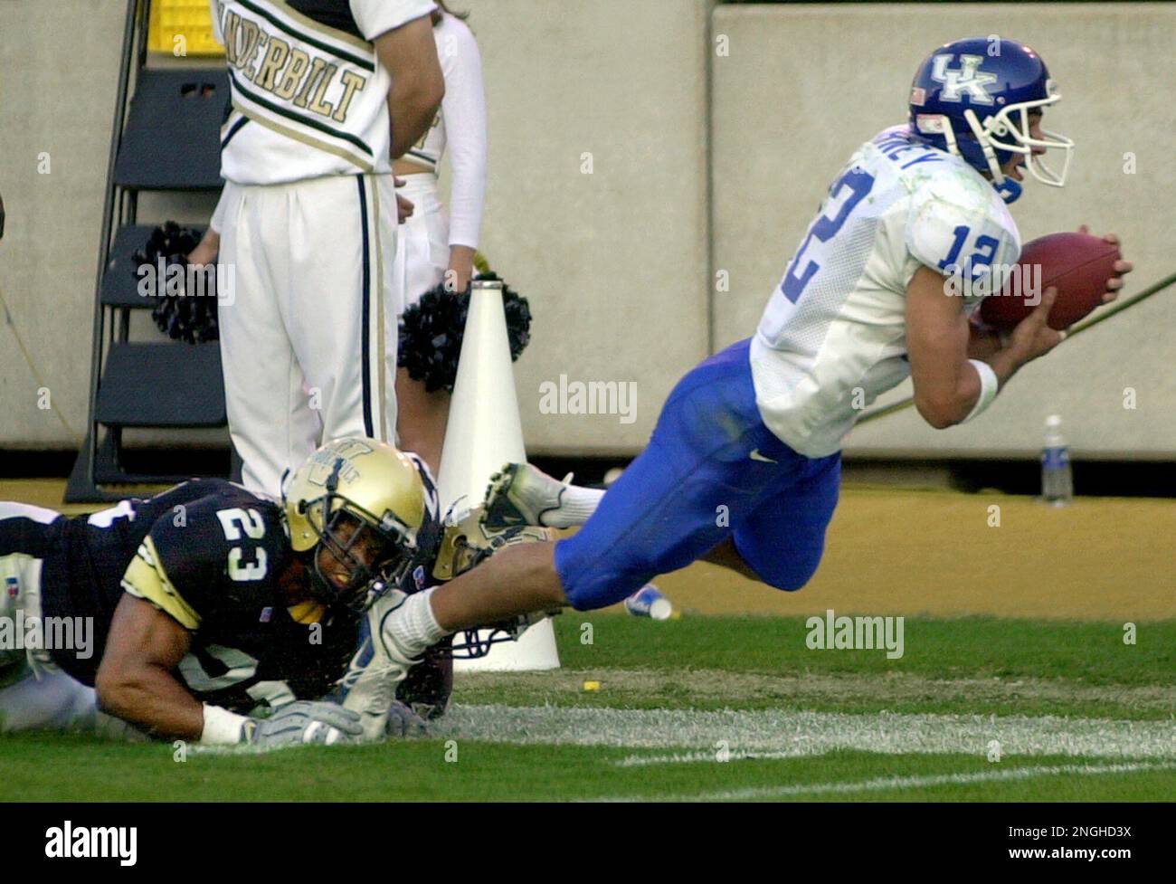 Kentucky wide receiver Derek Abney (12) is tripped up by Vanderbilt ...