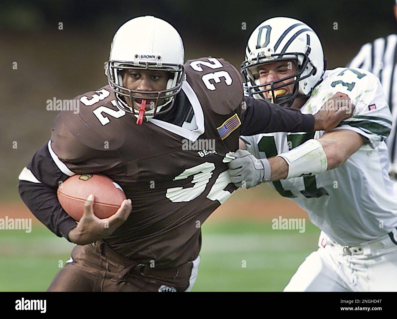 Brown's Joe Rackley (32) tries to fend off Dartmouth's Phil Frost (17 ...