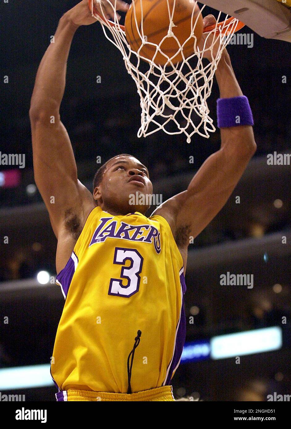 Los Angeles Lakers' Devean George dunks in the waning seconds of the ...
