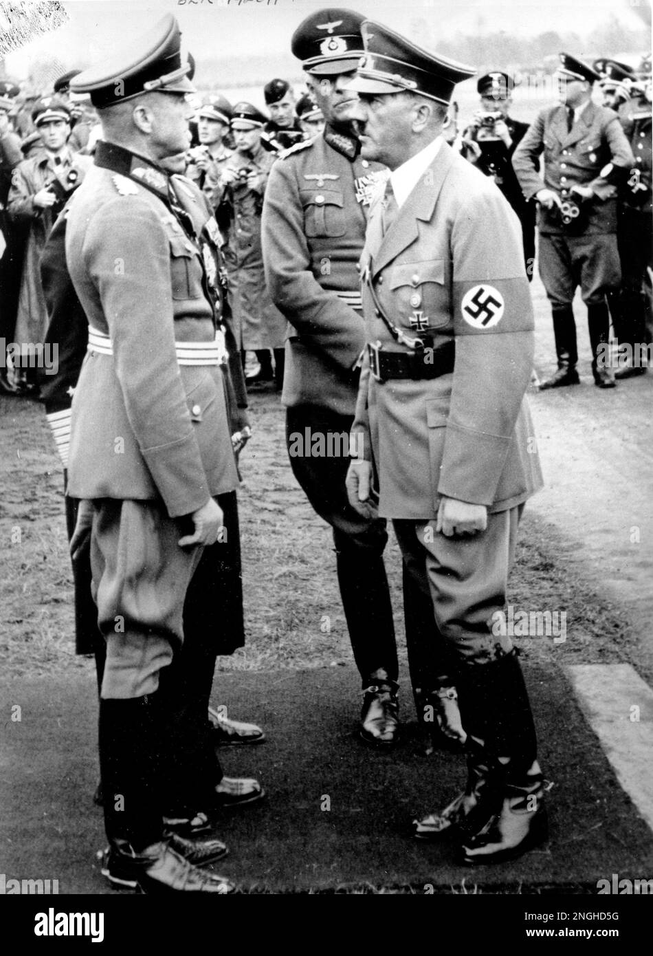 German Chancellor and Nazi Party leader Adolf Hitler, wearing Swastika ...